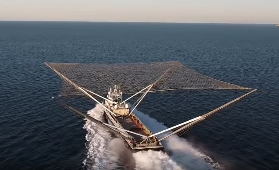 Watch SpaceX Catch a Rocket Nose Cone in a Giant Net on a Ship ...